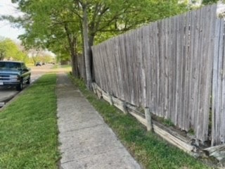 Before Replaced wood wall with Milsap stone wall Carrollton Texas